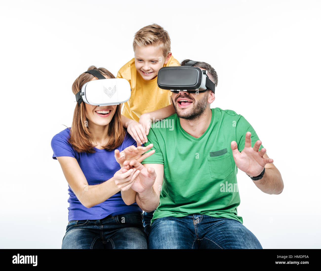Family using virtual reality headsets Stock Photo - Alamy