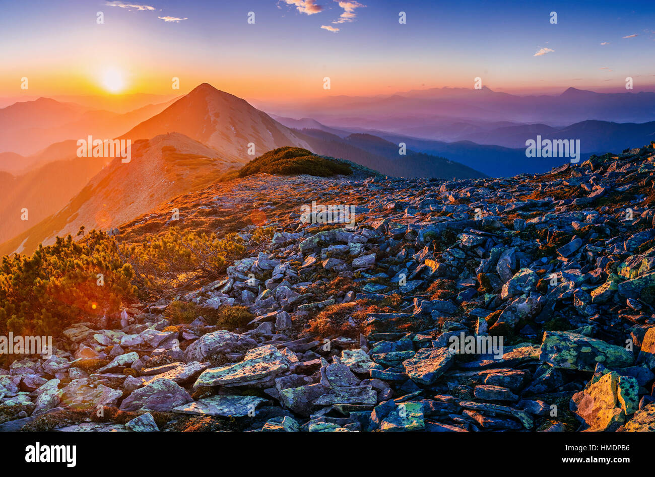 magic sunset in the mountains Stock Photo - Alamy
