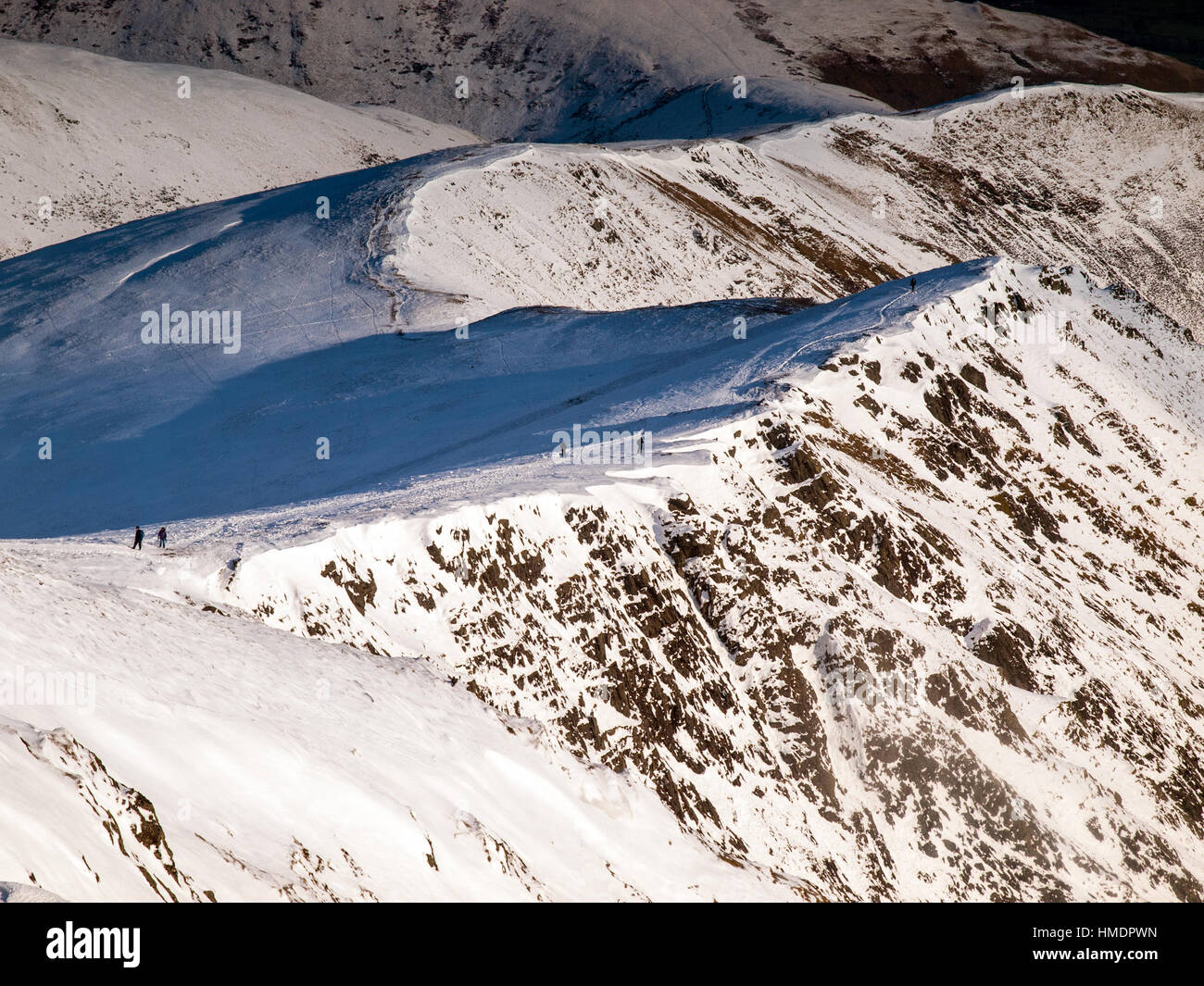 Walking on Blencathra in winter, Lake District National Park Stock ...