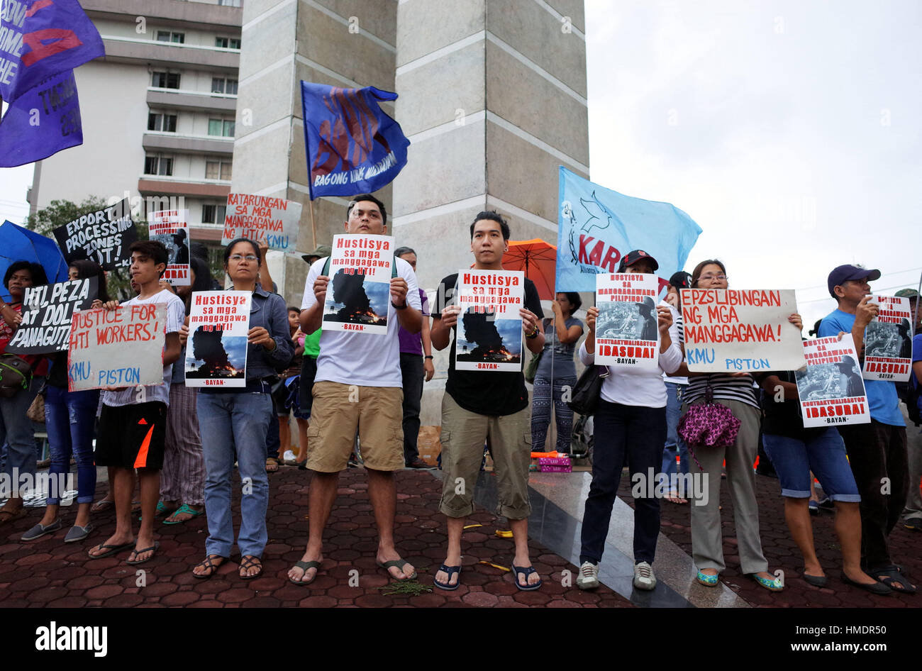 Quezon City, Philippines. 02nd Feb, 2017. Filipino workers hold ...
