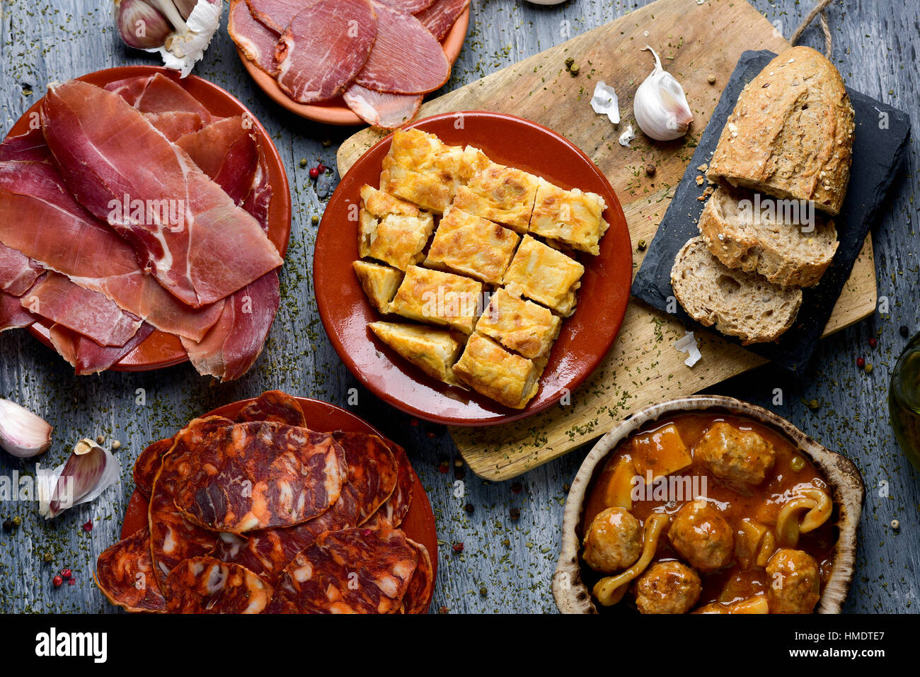 high-angle shot of some plates with an assortment of different spanish ...