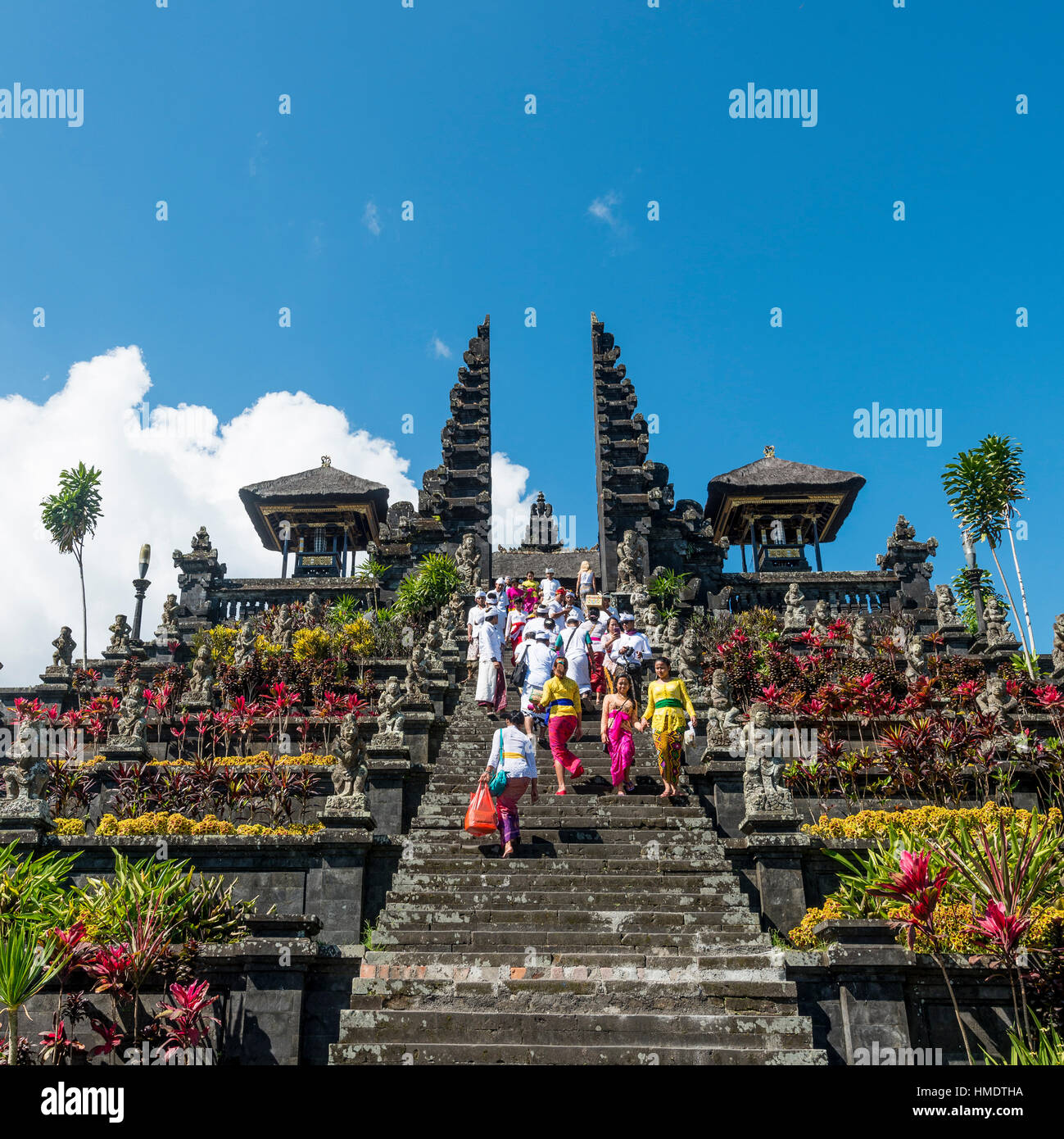 Devout Balinese descend stairs, split gate, Candi bentar, mother temple ...