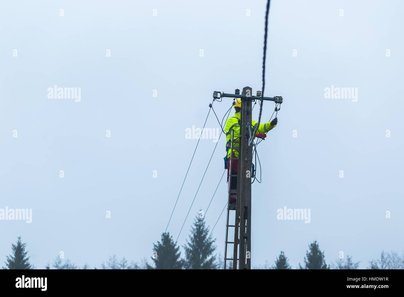 Electrician working on power lines. Failure of power lines on power ...