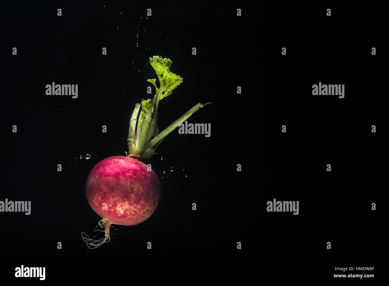 Red beet water splash hi-res stock photography and images - Alamy