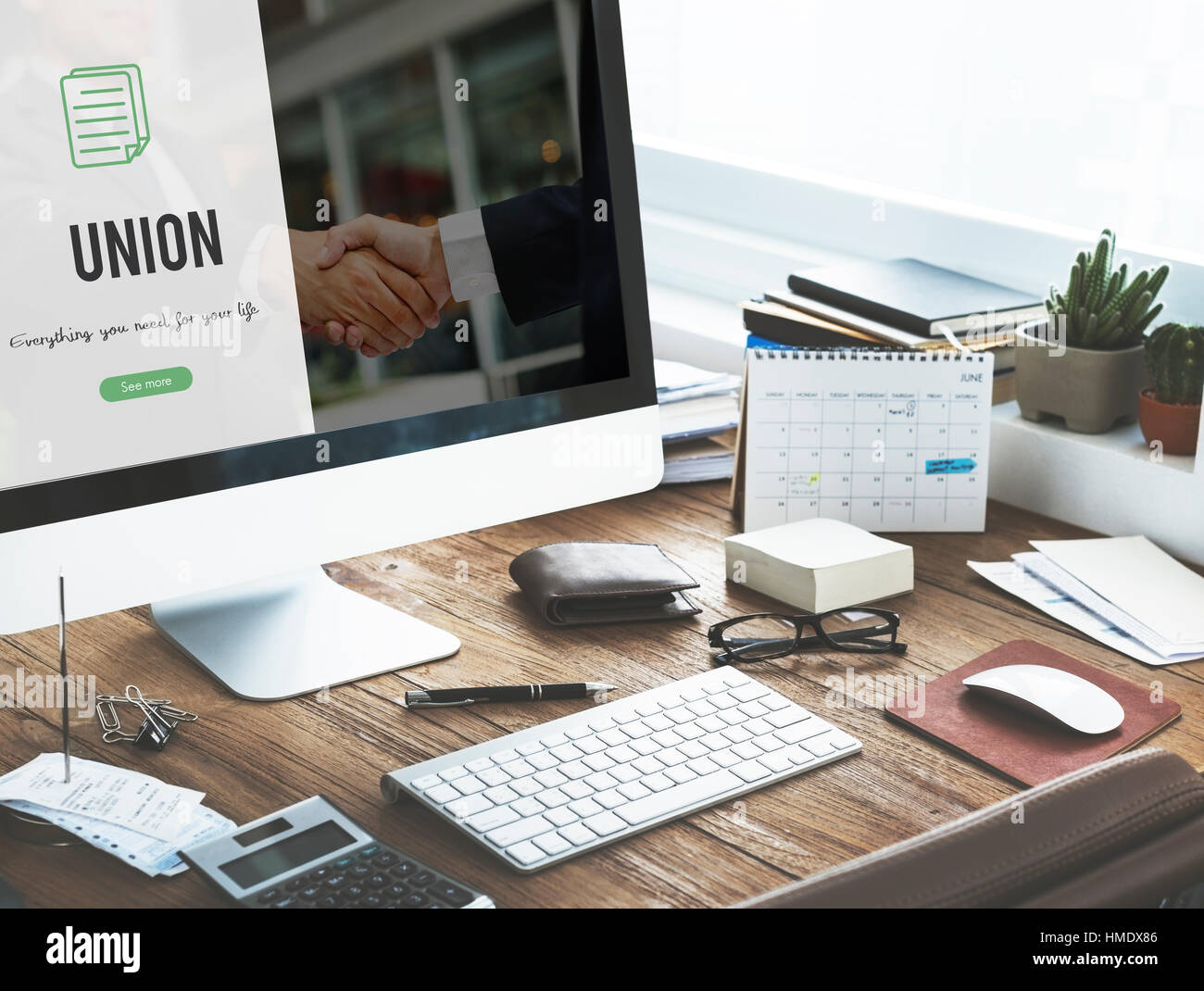 Union word on business handshake background Stock Photo - Alamy