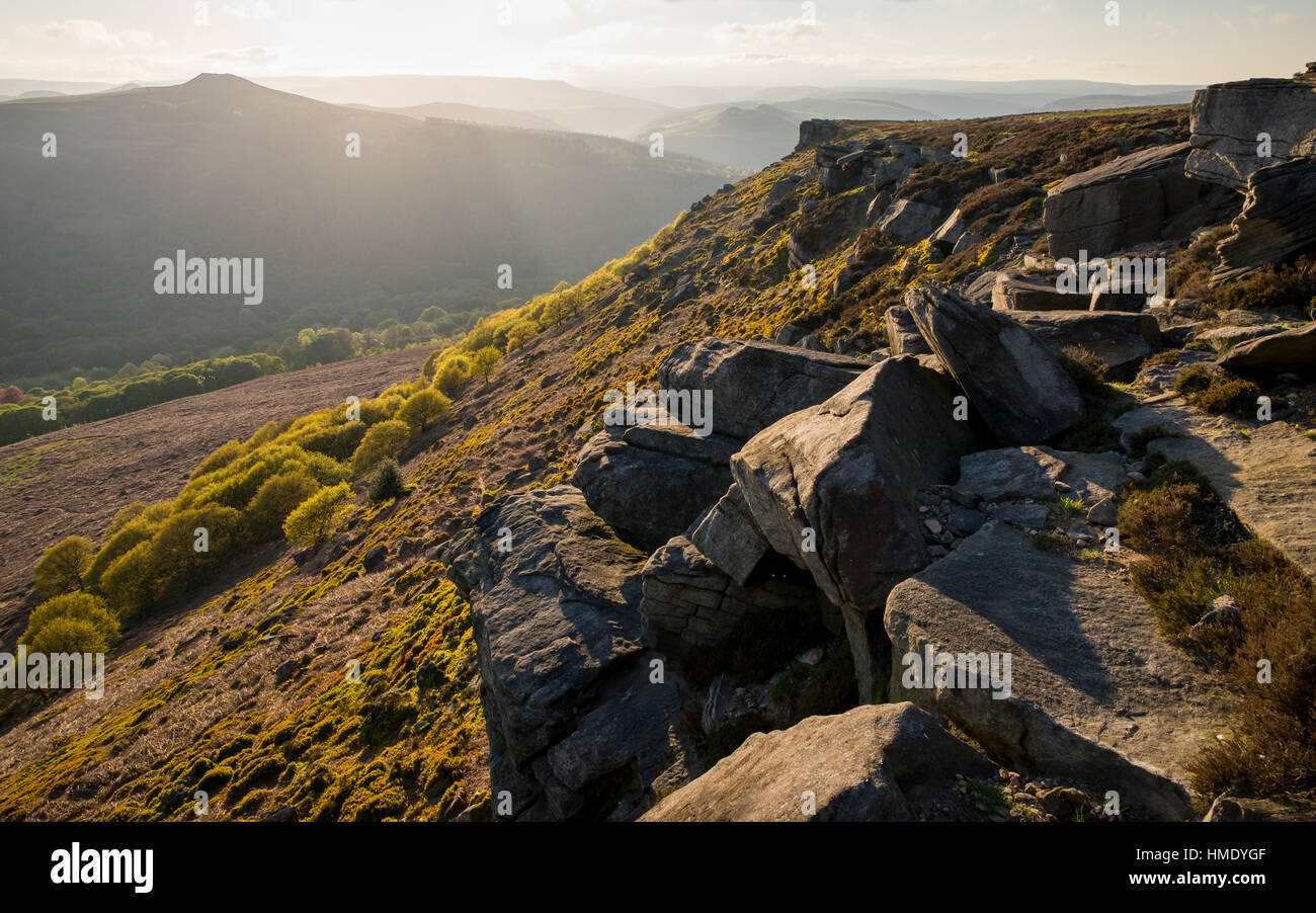 Rocks on Bamford edge in the Peak District park with view to Win hill ...