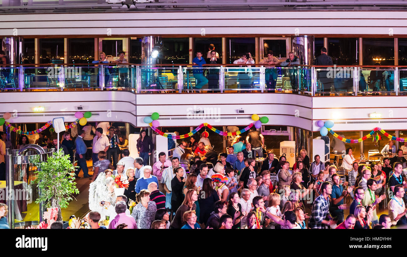 HELSINKI, FINLAND - SEPTEMBER 7, 2011: people on dancing party on deck ...