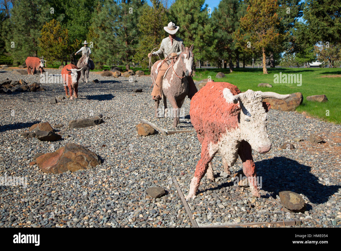 Cattle drive sculpture, Pendleton, Oregon Stock Photo - Alamy