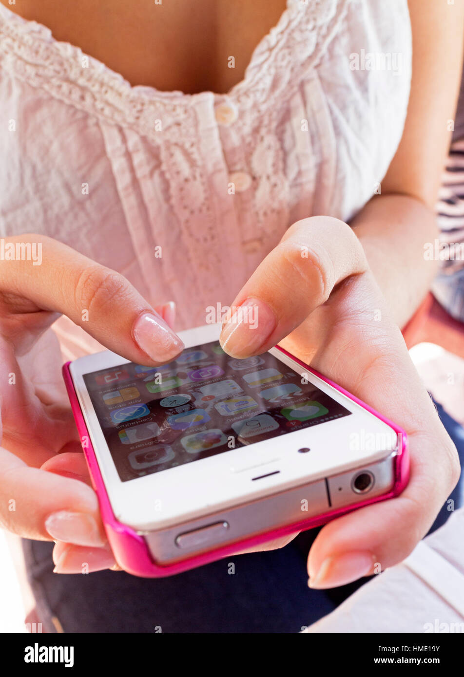Teenage girl with her smart phone Stock Photo - Alamy