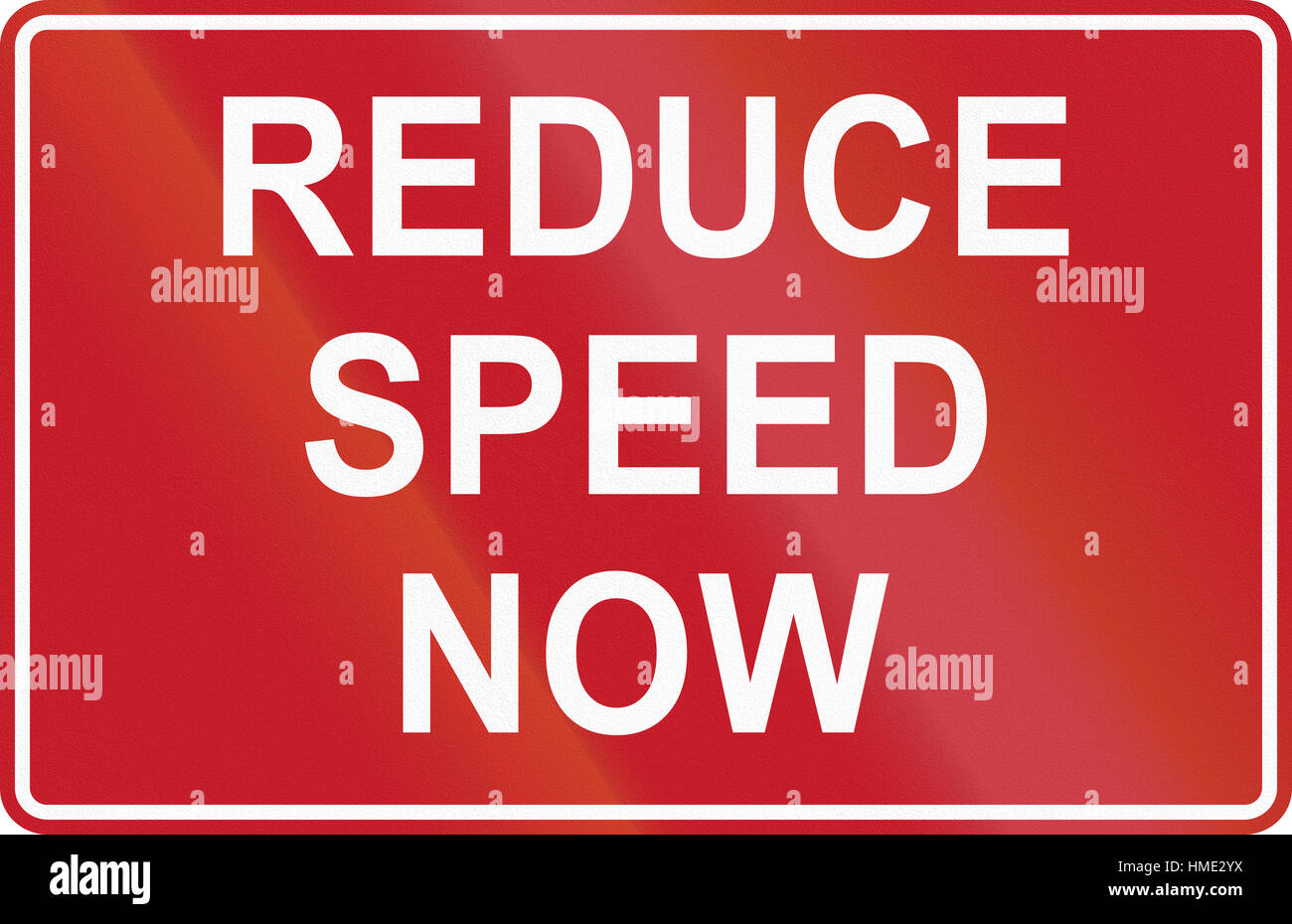 Road sign in the Philippines - Reduce Speed Now Stock Photo - Alamy