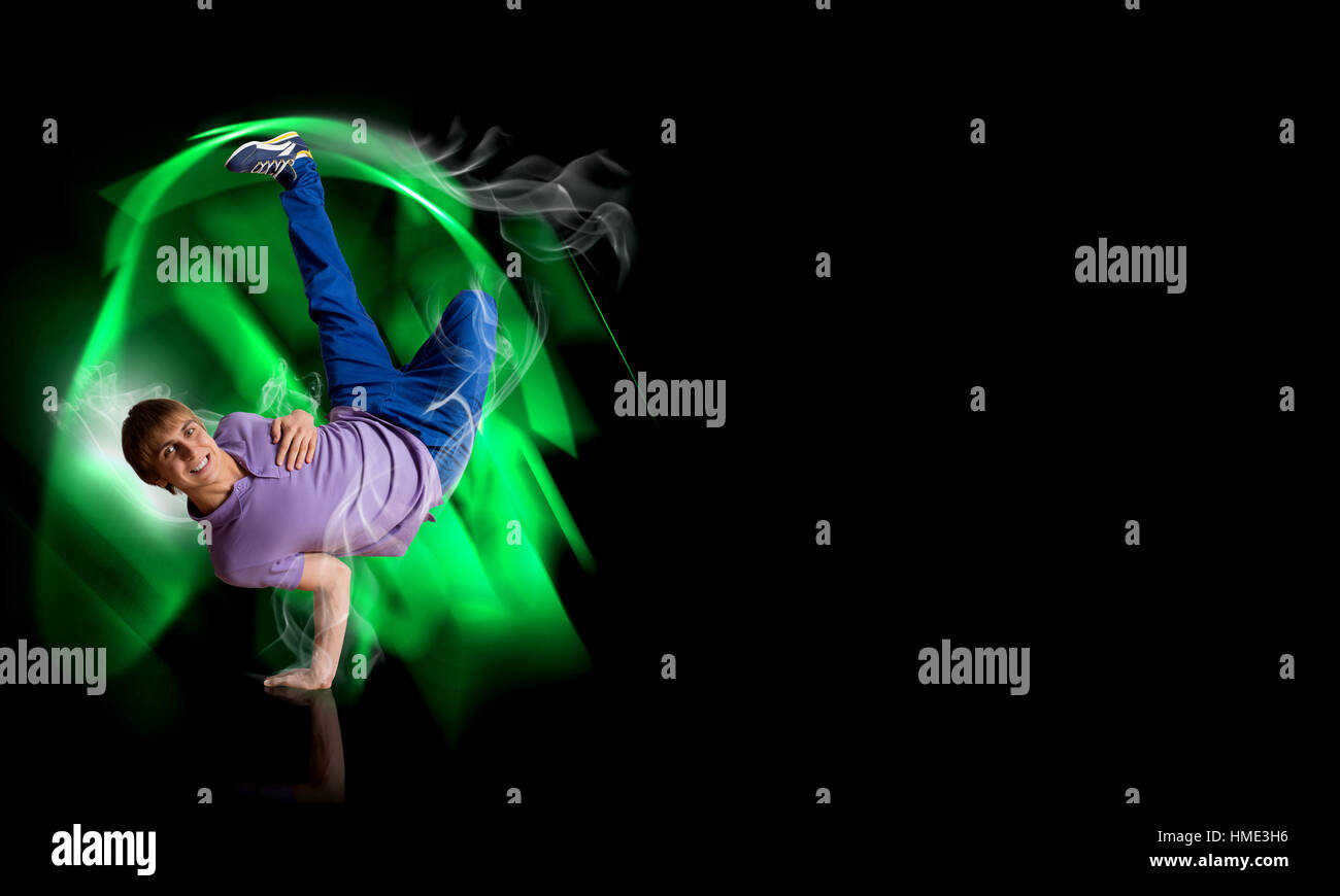 Breakdancer standing on hand Stock Photo - Alamy