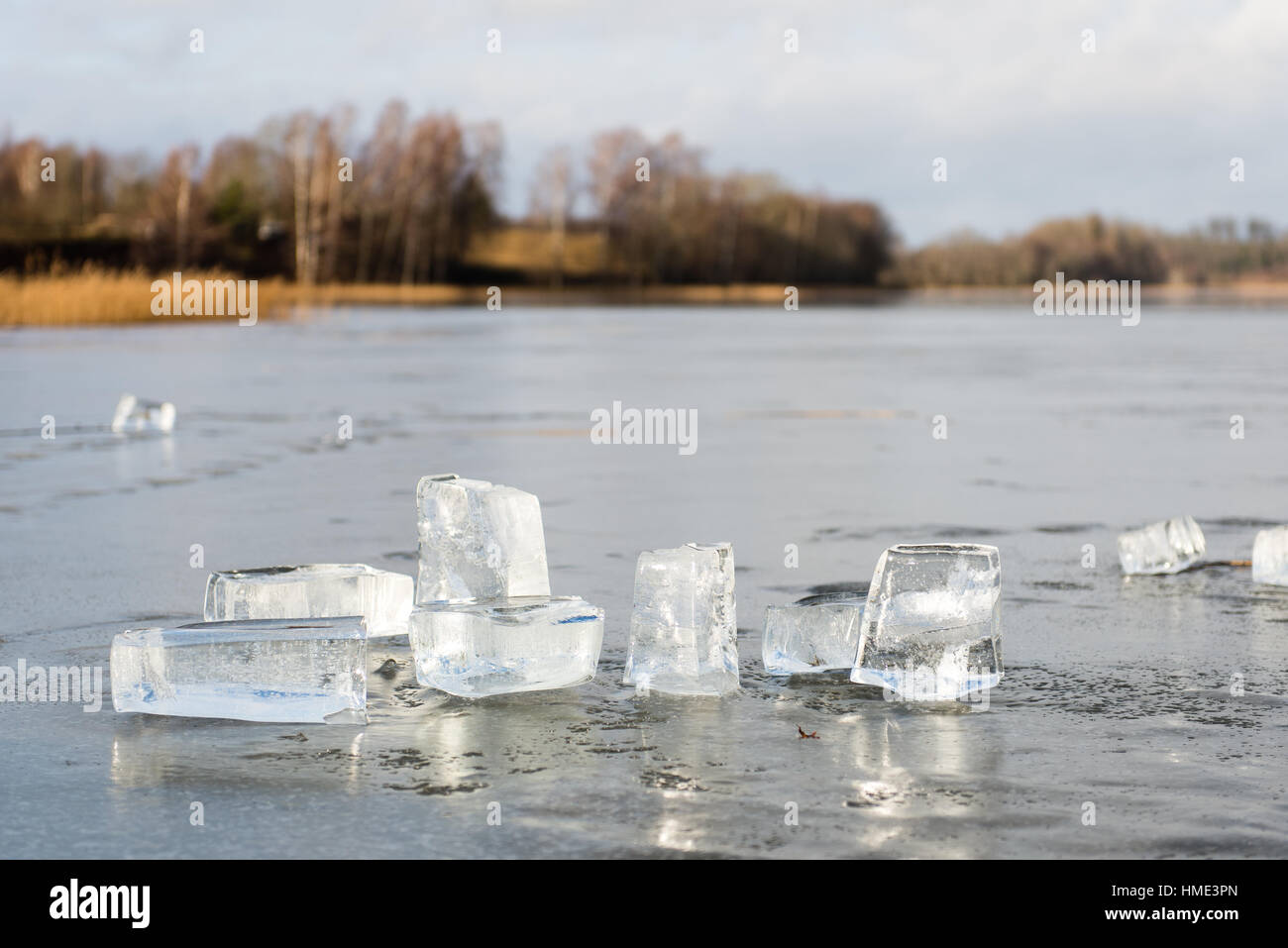 frozen beach view by the baltic sea with sand and ice in water Stock ...