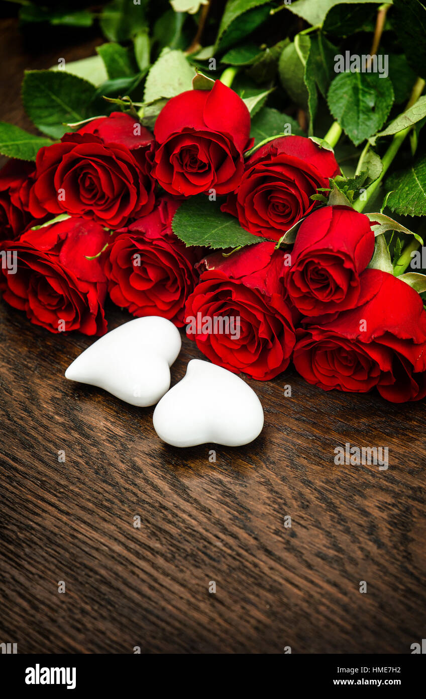 Red roses and two hearts. Valentines Day decoration. Holidays ...