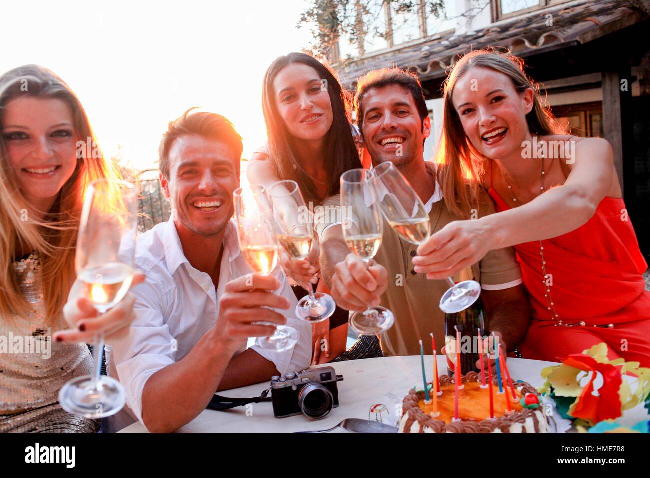 Friends enjoying birthday party Stock Photo - Alamy
