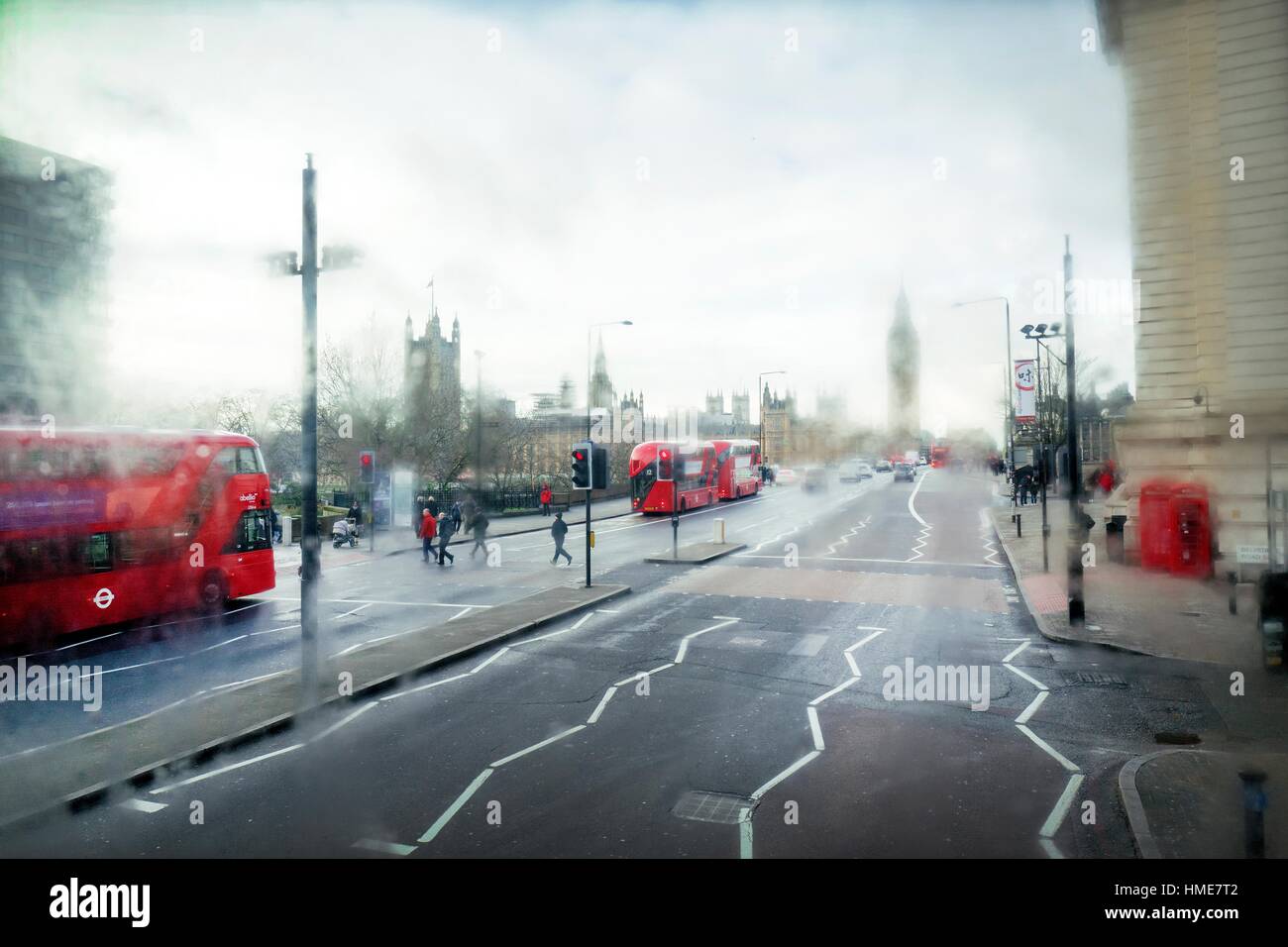 Street scene, view from bus rear window on a rainy day. Westminster ...