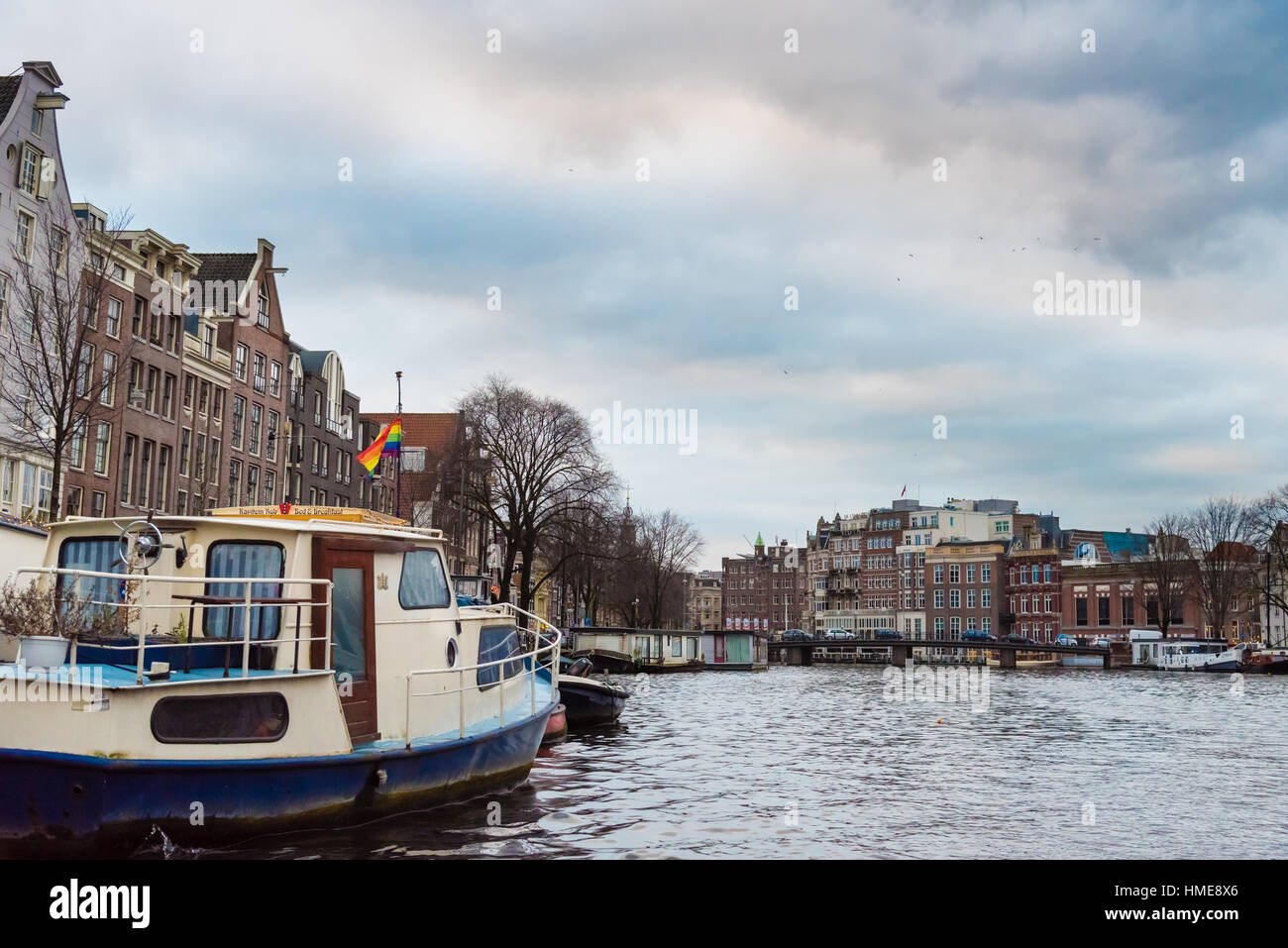 Amsterdam, Netherlands - January 9, 2017: Street view with traditional ...