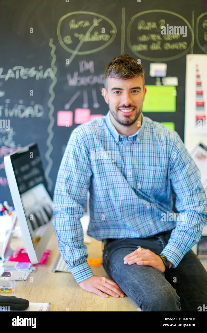 Portrait of man executive working in office. Advertising agency Stock ...