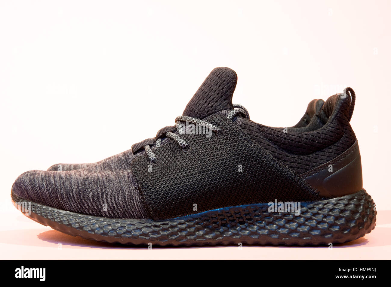 A pair of modern mesh running shoes Stock Photo - Alamy