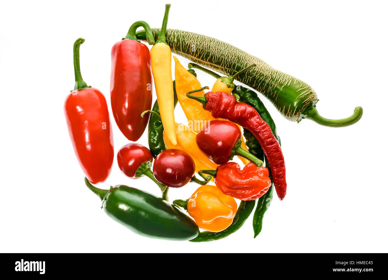 Different variety of hot peppers - a bunch of chilies, isolated on ...