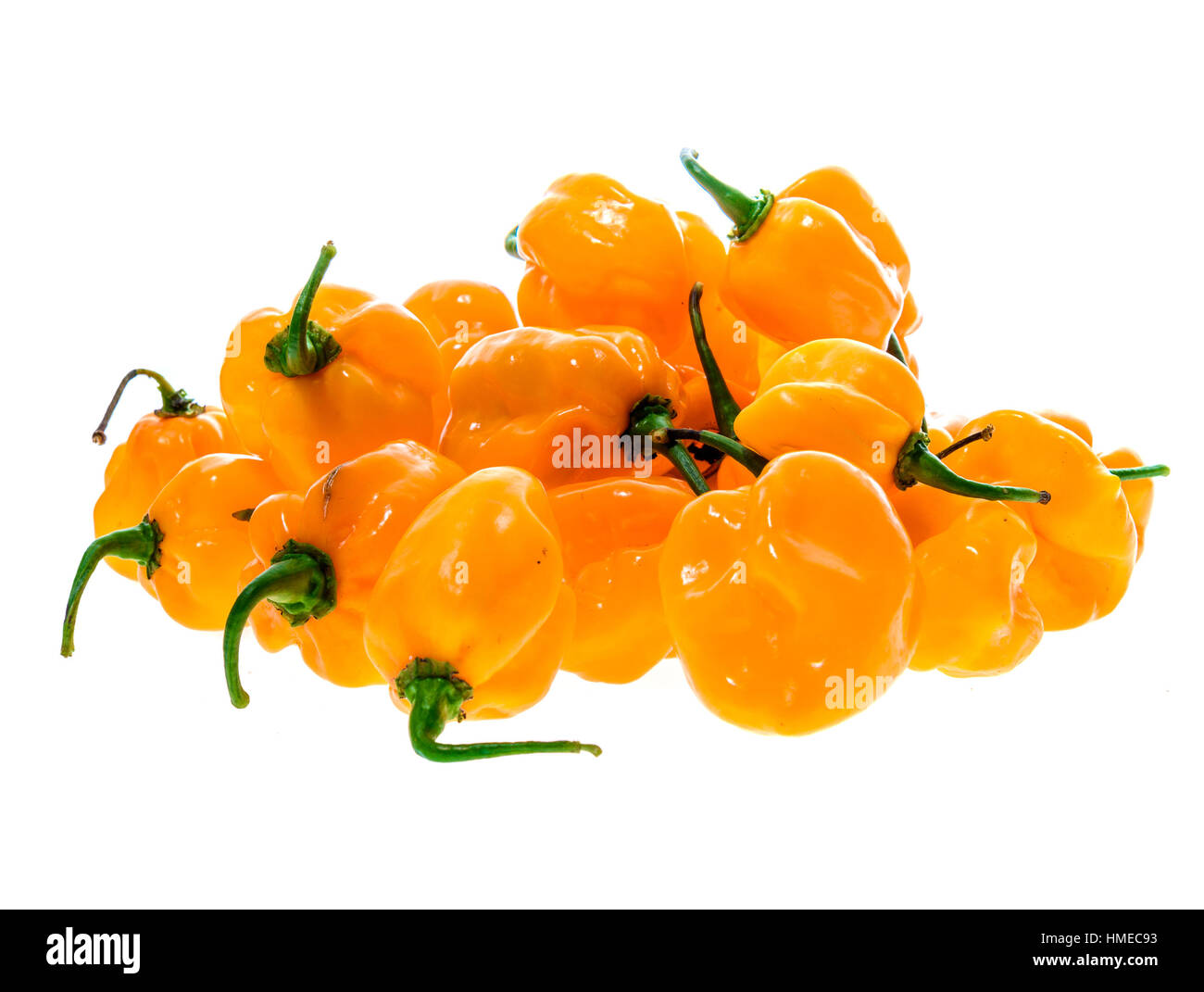 Bunch of Yellow orange ripe habanero hot chili peppers. Isolated on ...