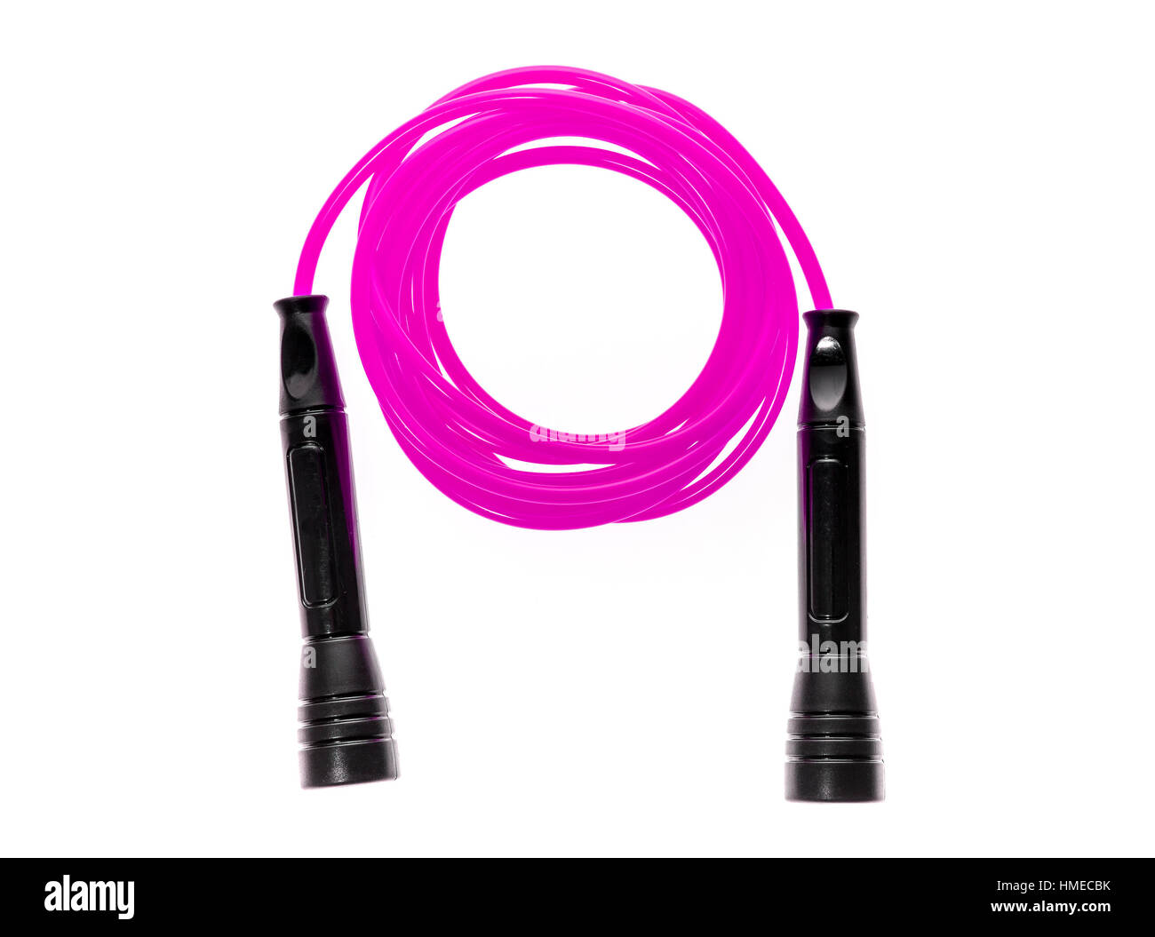 Pink jump rope or skipping rope isolated on white background. Sports ...