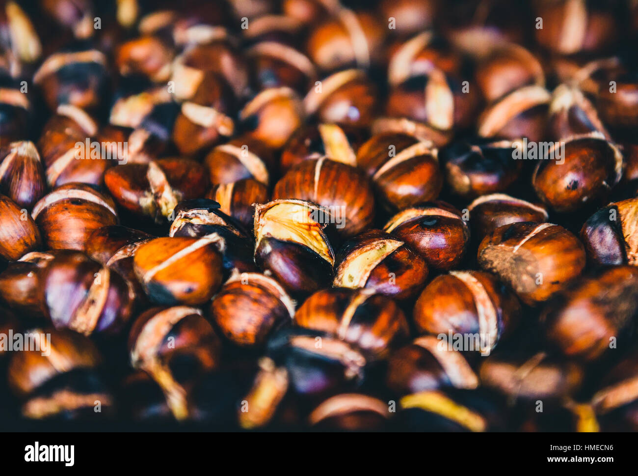 Roasting grilled Chestnuts on barbecue with flames, fire and charcoal ...