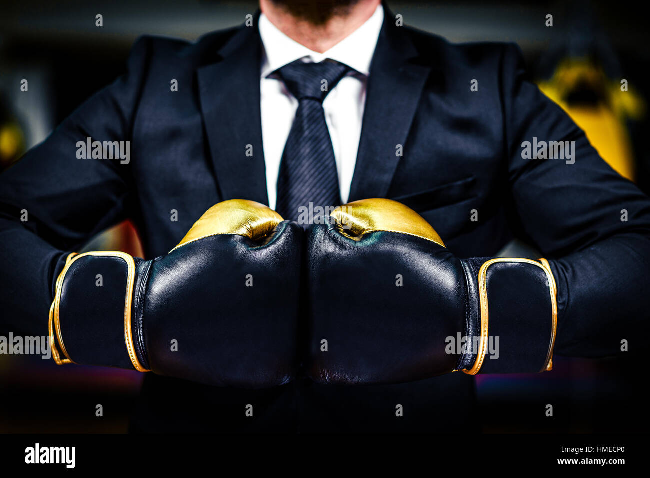 Man holding boxing gloves hi-res stock photography and images - Alamy