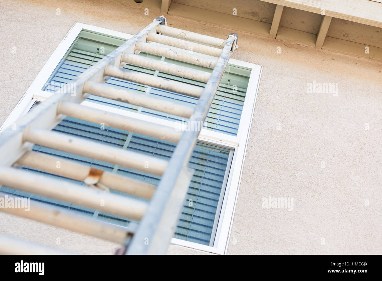 Aluminum Construction Ladder Leaning Against House Stock Photo - Alamy