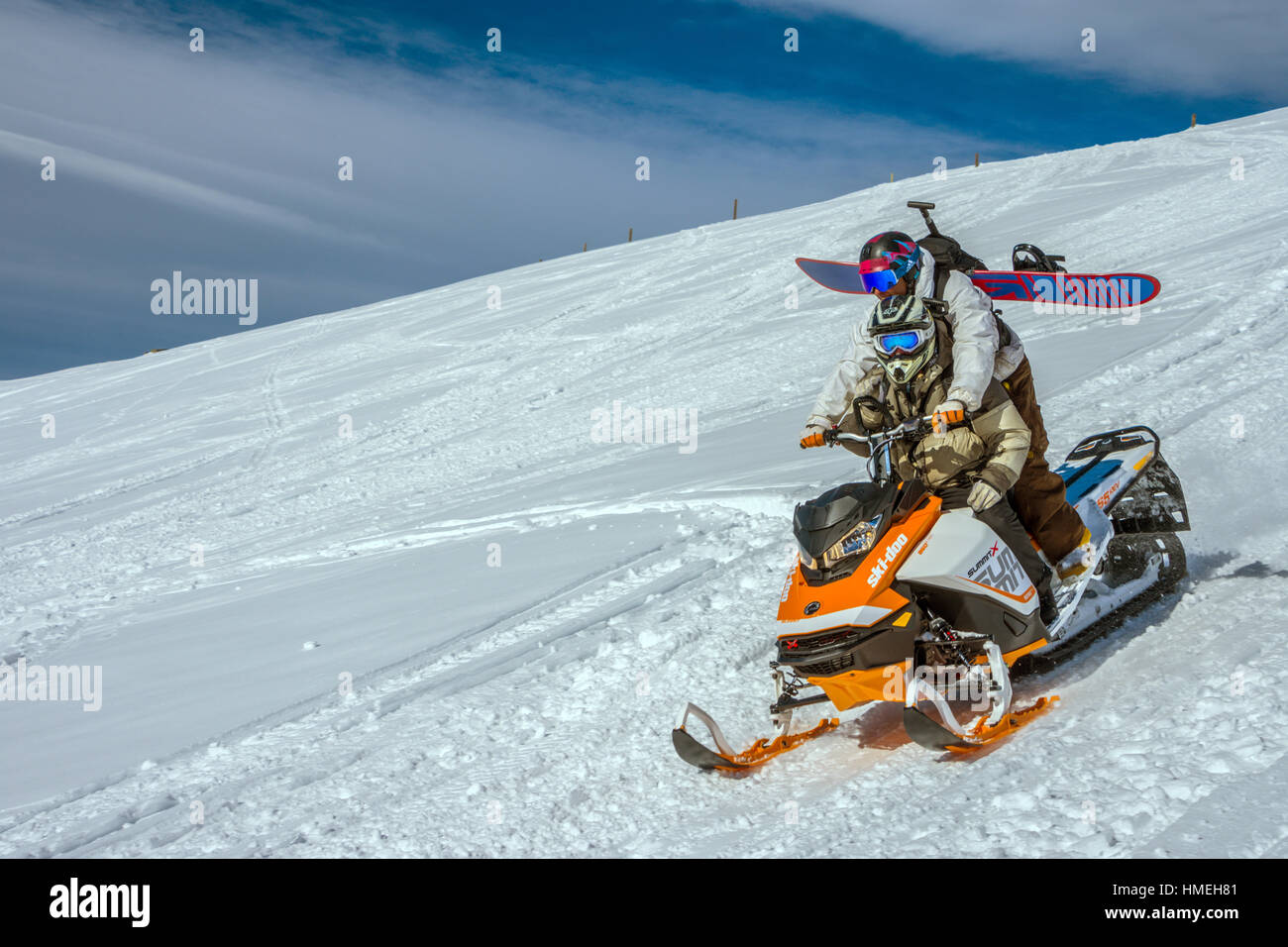 Two men on snowmobile on hi-res stock photography and images - Alamy