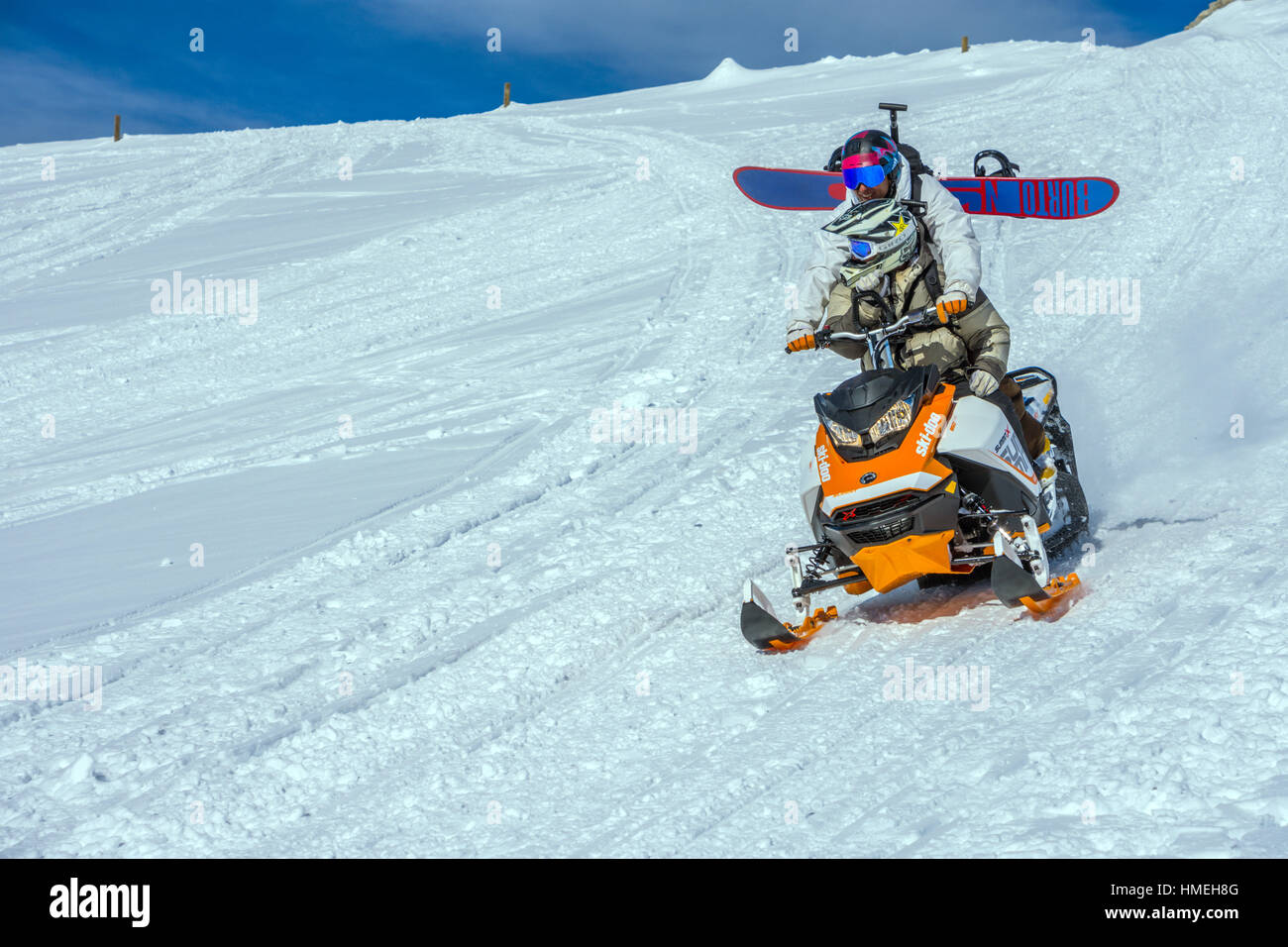 Two men on snowmobile on hi-res stock photography and images - Alamy