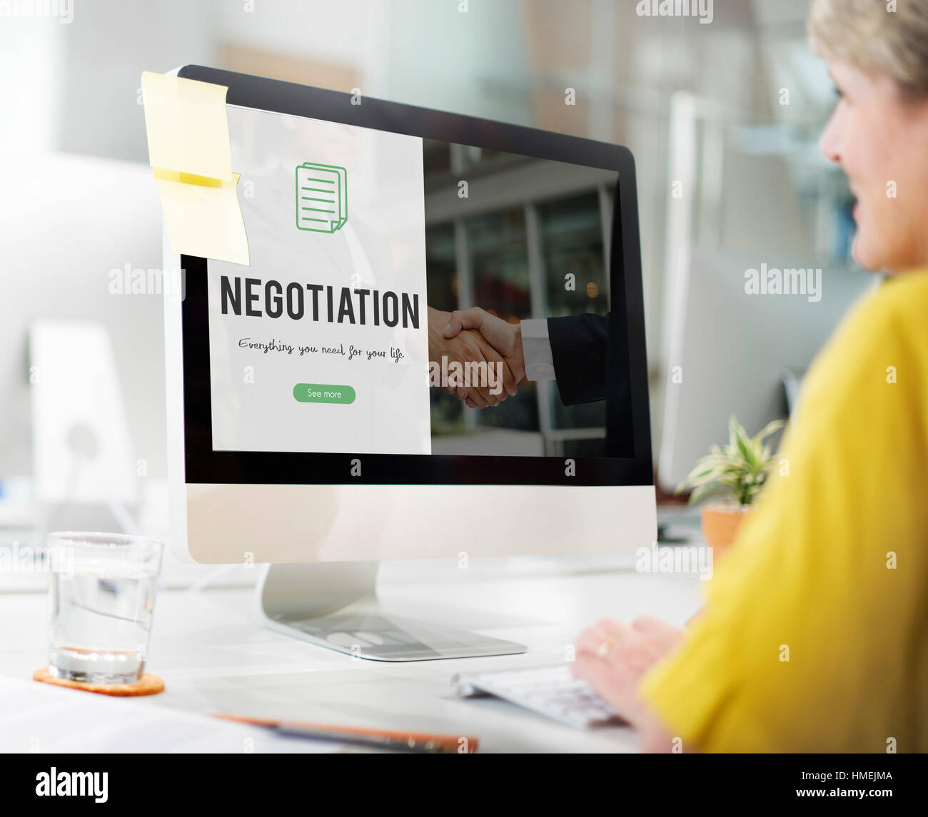 Negotiation word on business handshake background Stock Photo - Alamy