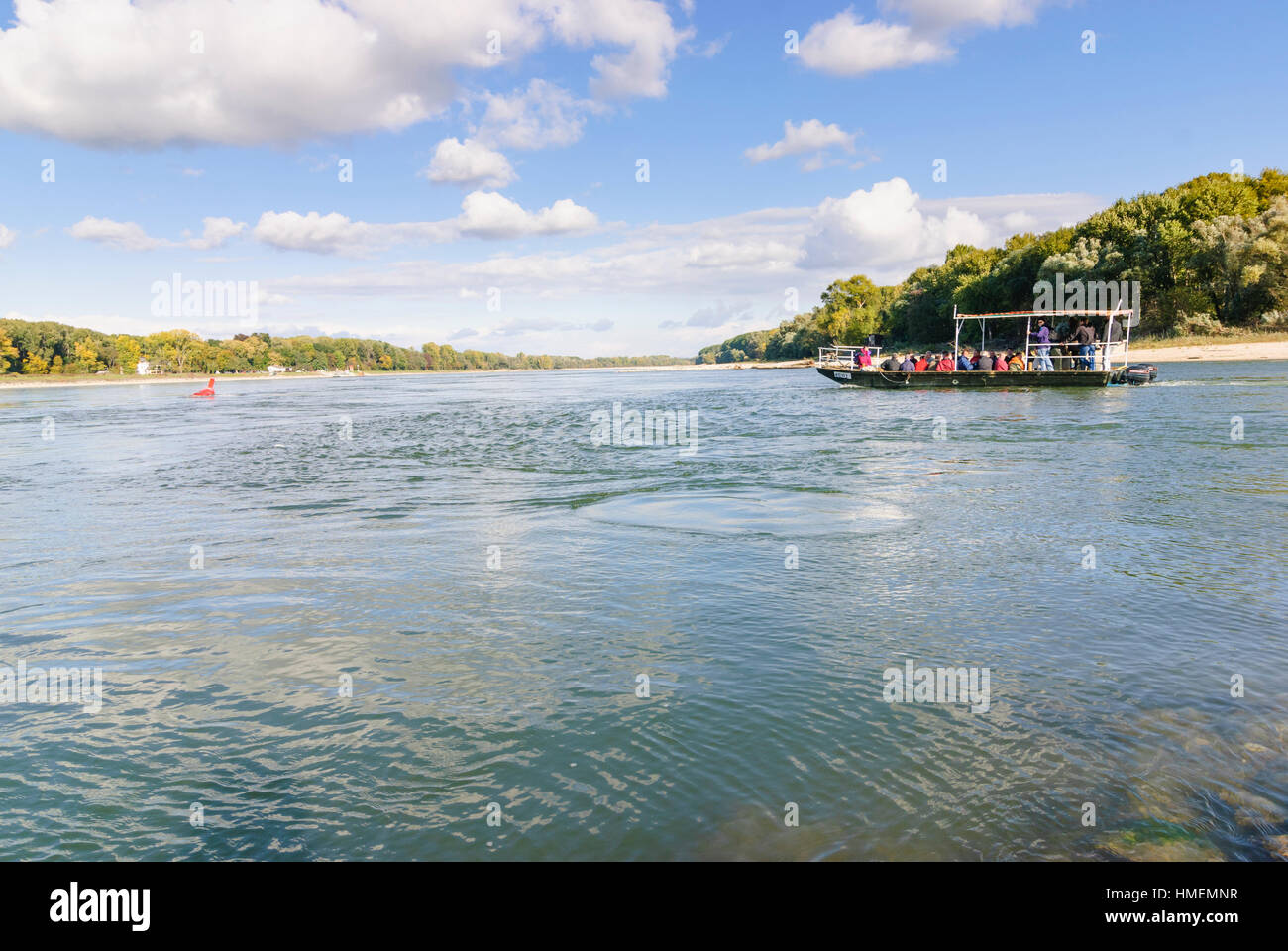 Orth an der Donau: National Park Donauauen; Tourists on passenger ferry ...