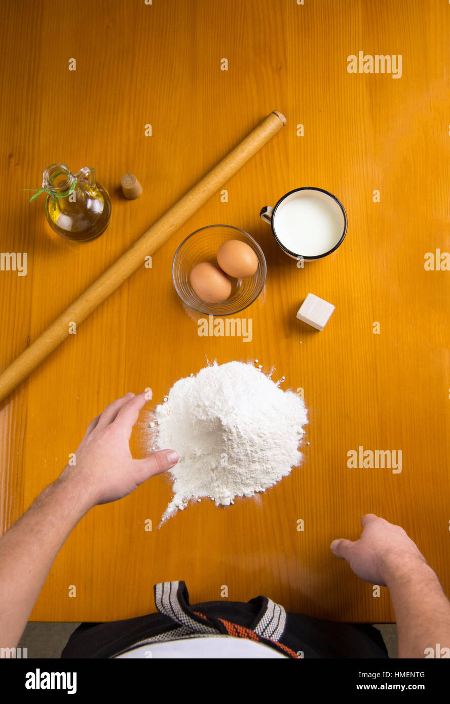 Man working with flour first person view Stock Photo - Alamy