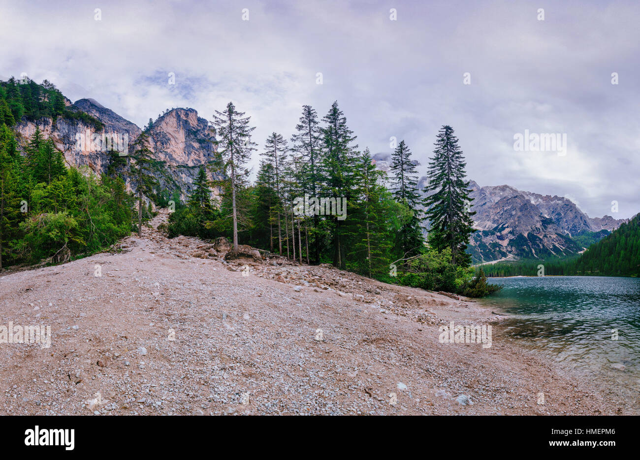 Mountain lake between by mountains Stock Photo - Alamy
