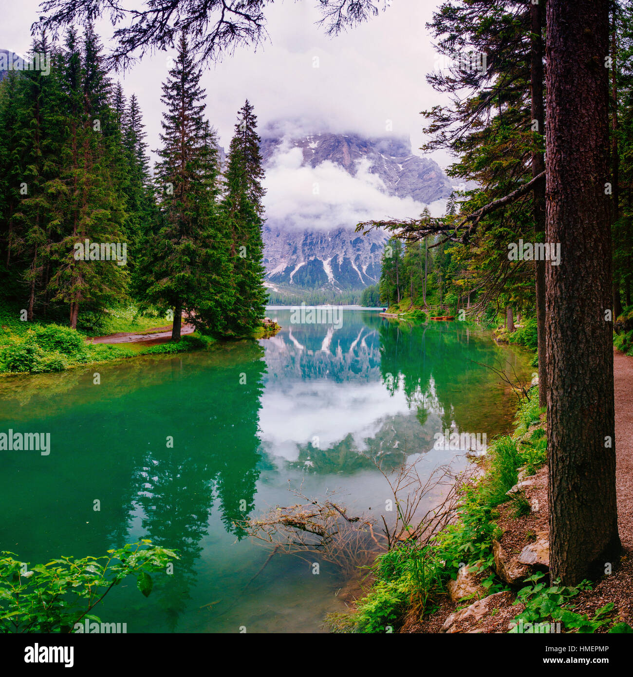 Mountain lake between by mountains Stock Photo - Alamy