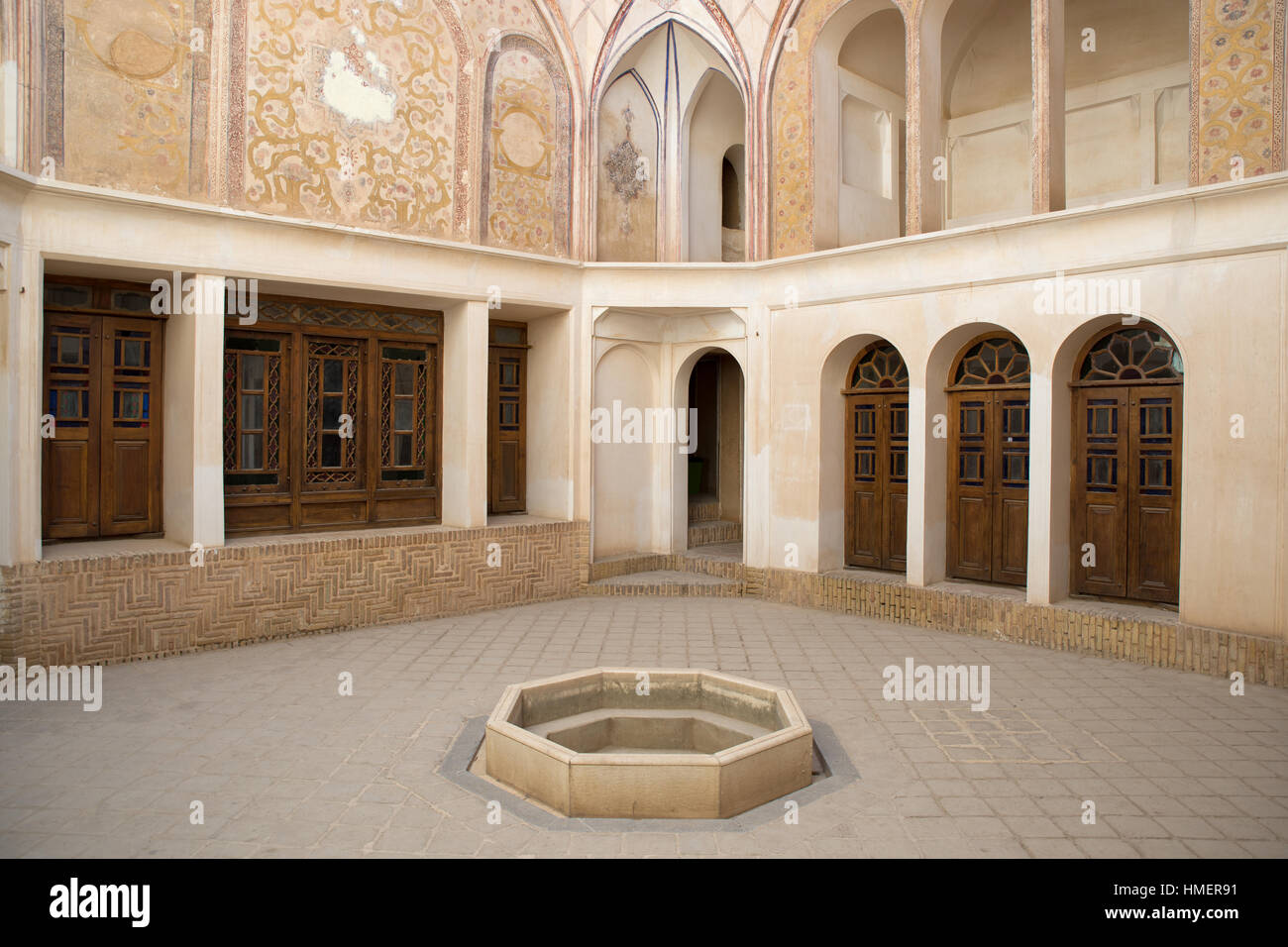 Private courtyard with hexagonal pool at Tabatabaei Historical House ...