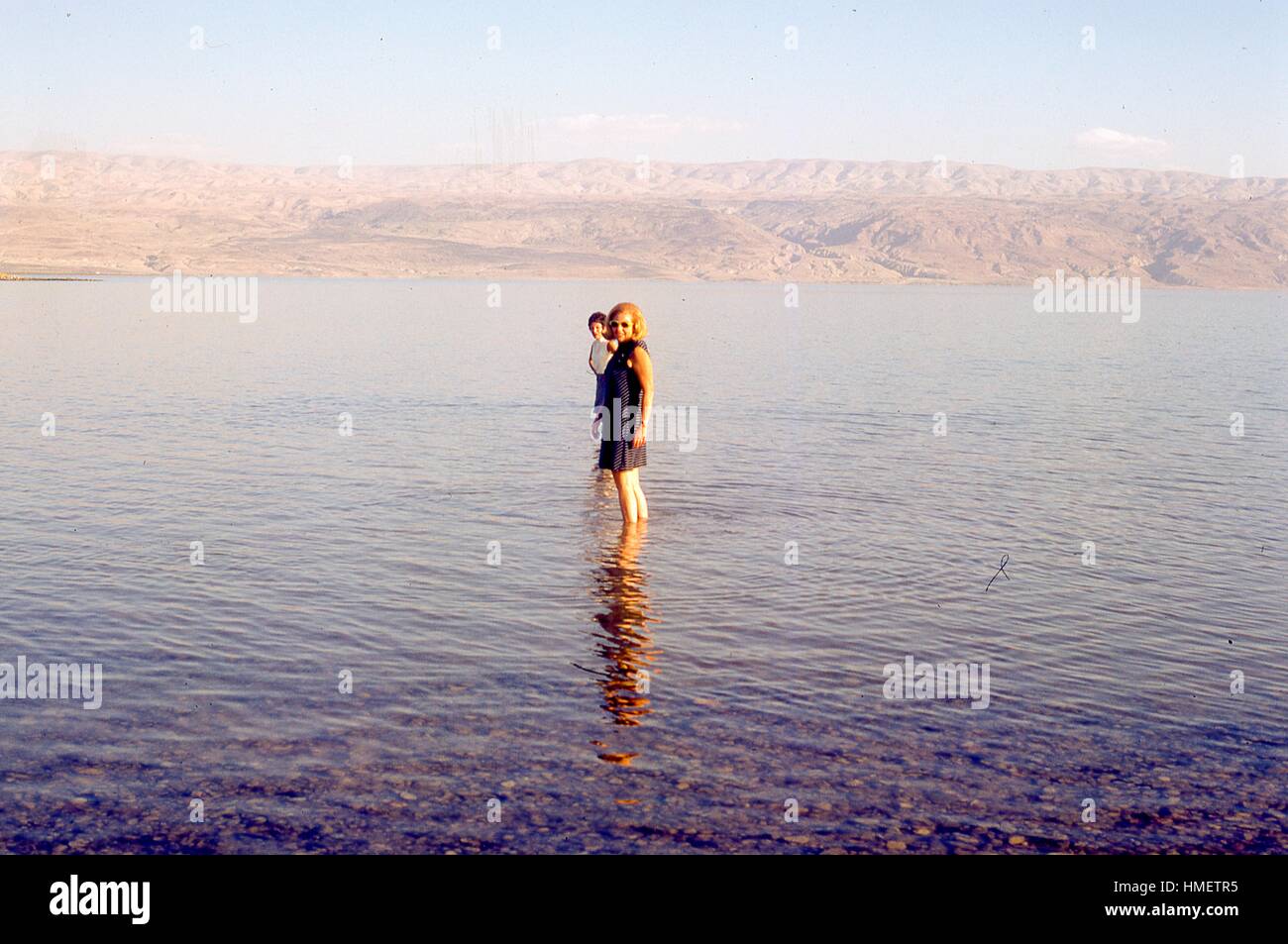 View of two women wading in the water at Lido Beach, on the ...