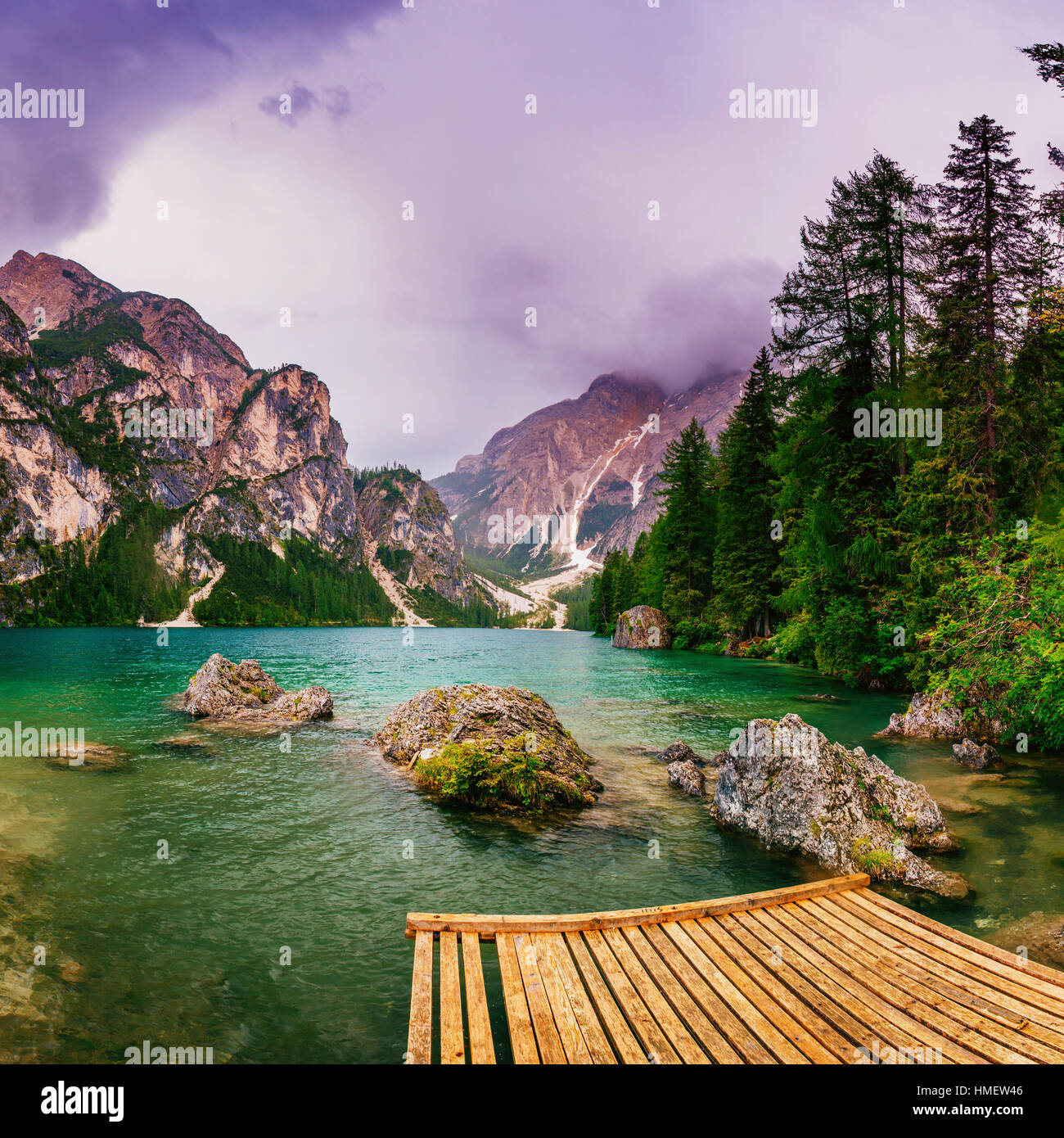 Mountain lake between by mountains Stock Photo - Alamy