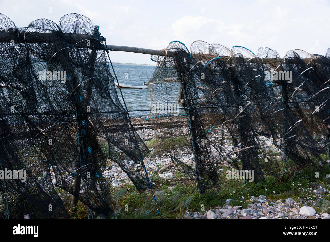 Fisherman hanging fishing nets hi-res stock photography and images - Alamy