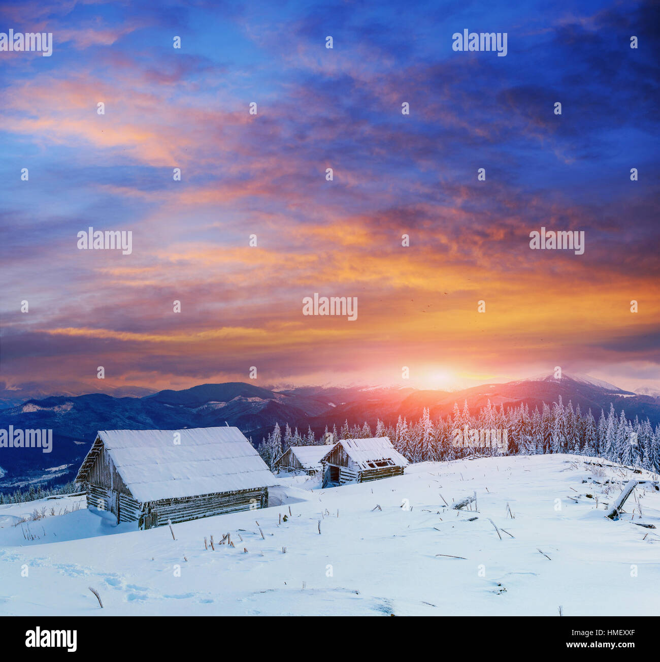 cottage in snowy mountains Stock Photo - Alamy