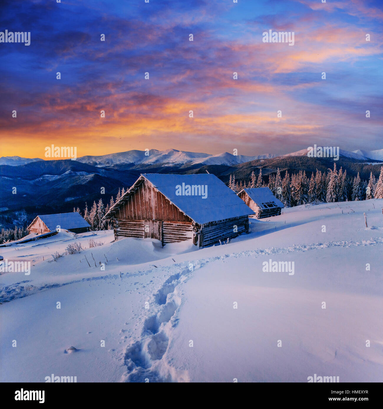 cottage in snowy mountains Stock Photo - Alamy