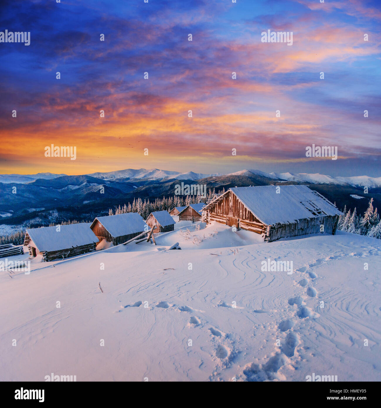 cottage in snowy mountains Stock Photo - Alamy