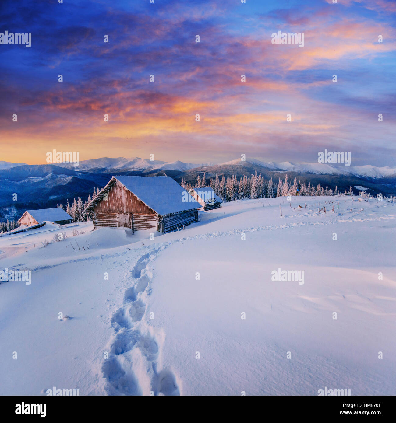 cottage in snowy mountains Stock Photo - Alamy