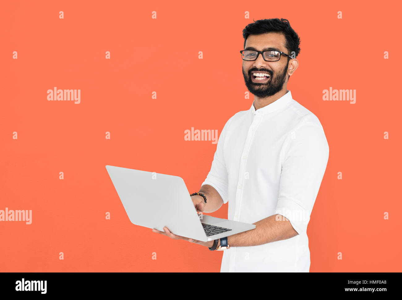 Cheerful Man Technology Gadget Concept Stock Photo - Alamy