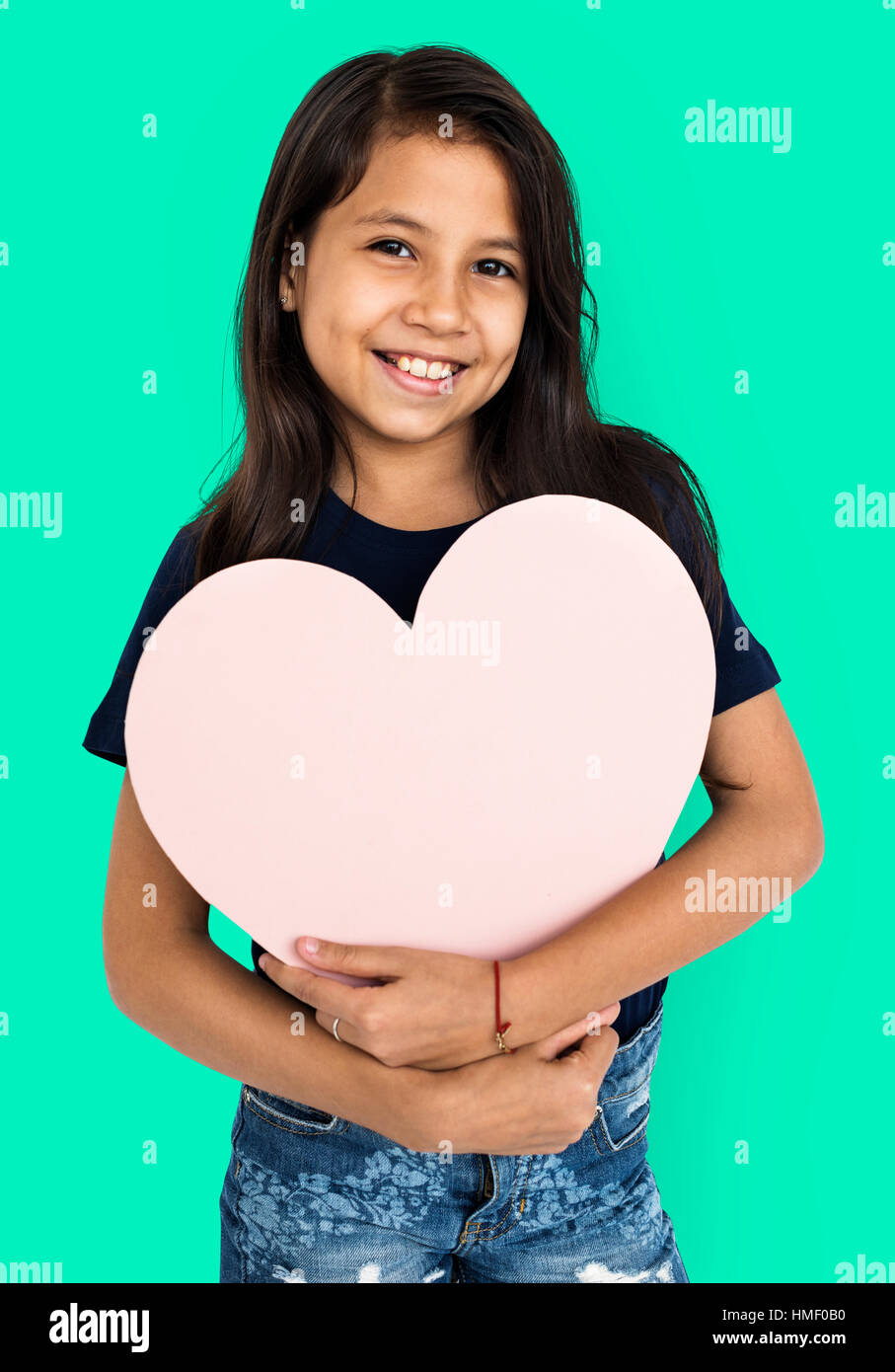 Little Girl Carrying Heart Concept Stock Photo - Alamy