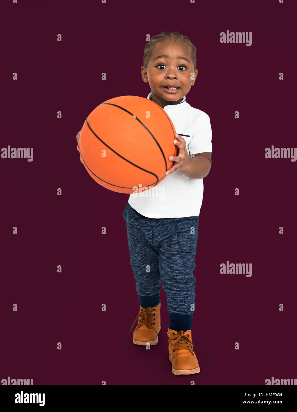 Little Kid With Basketball Concept Stock Photo - Alamy