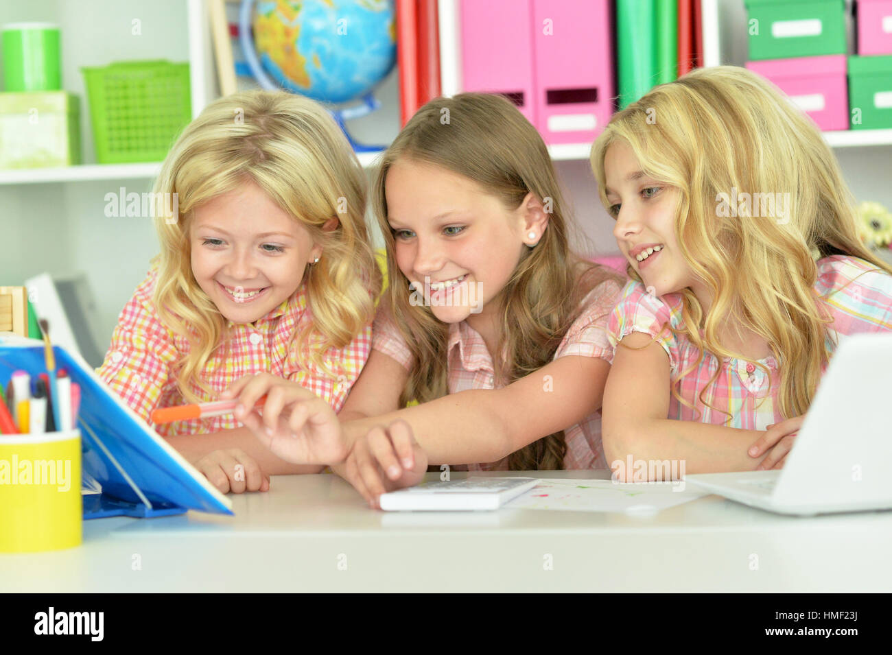 three little girls Stock Photo - Alamy