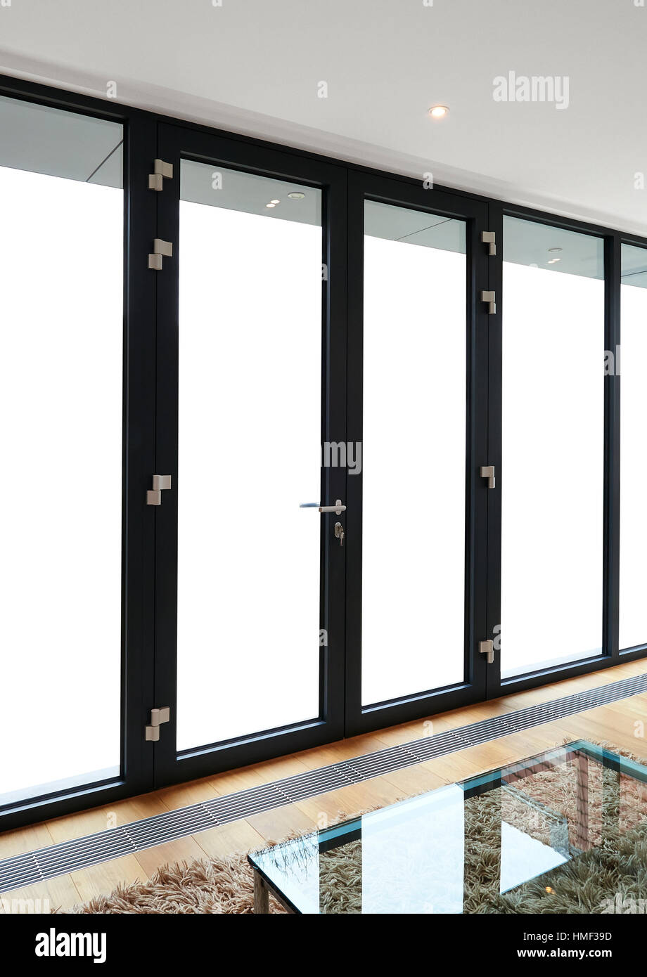 Living room with great windows and doors Stock Photo - Alamy