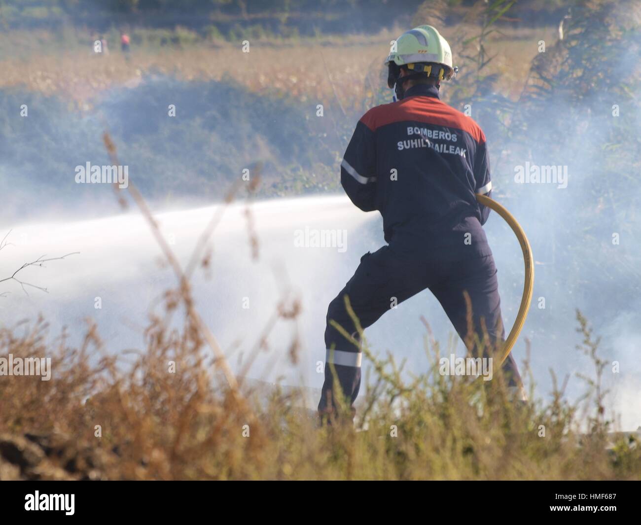 Hose fighting hi-res stock photography and images - Alamy