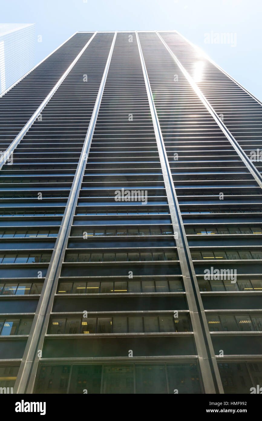 Very tall business center. Bottom view on skyscraper Stock Photo - Alamy